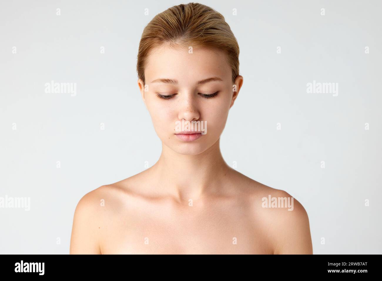 Portrait of attractive girl with smooth, well-kept beautiful skin ...