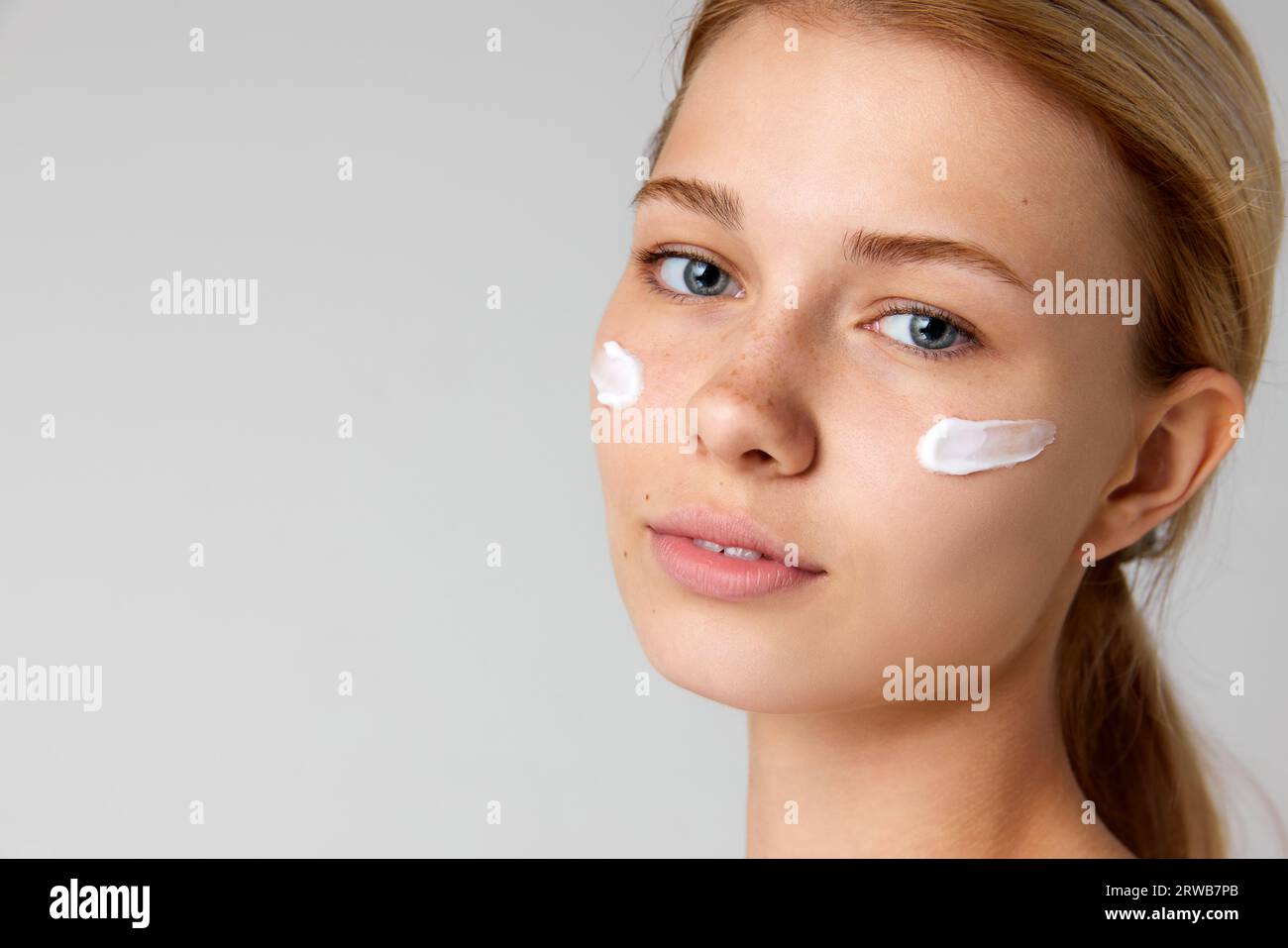 Close Up Portrait Of Pretty Young Girl With Spotless Well Kept Skin