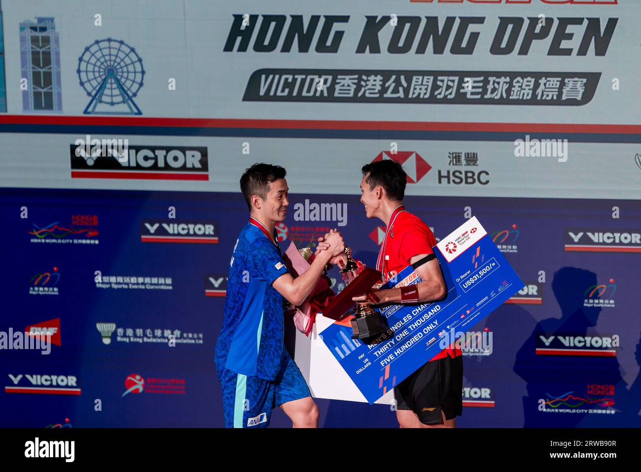 Jonatan Christie of Indonesia and Menta Nishimoto of Japan attended award ceremony after the men ...