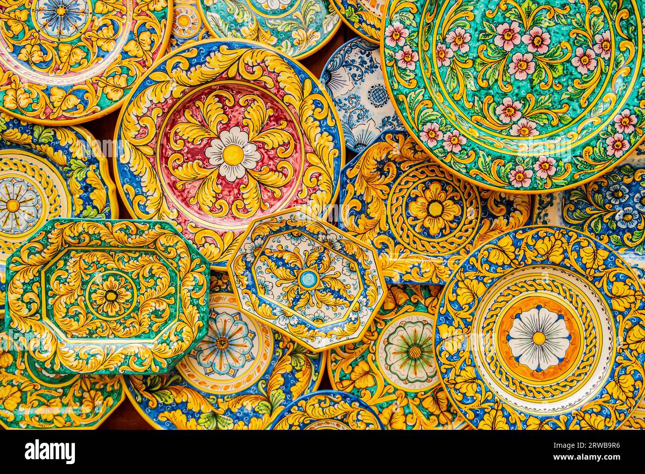 Background with decorated and colorful porcelain plates Stock Photo - Alamy