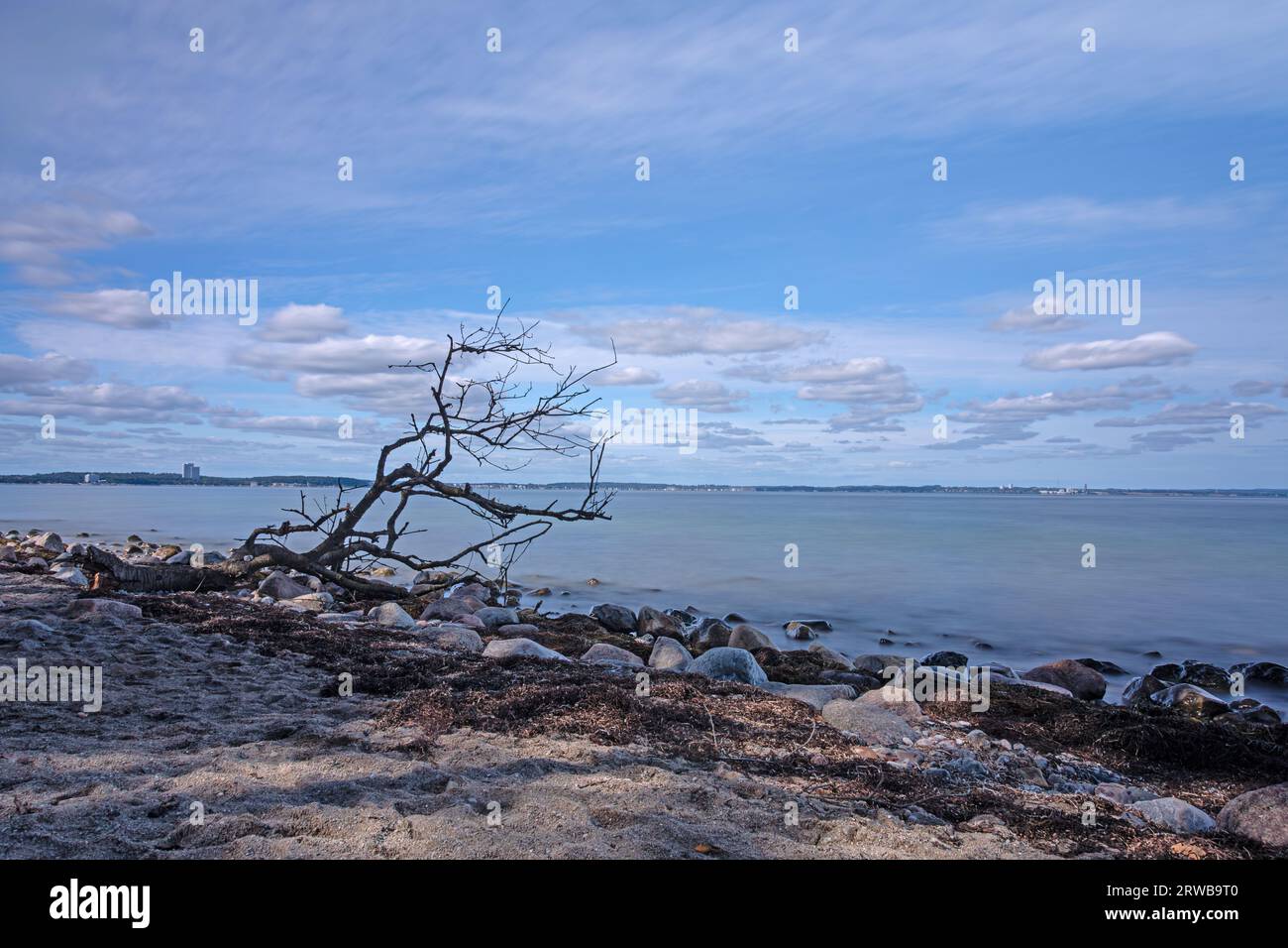 Rocky natural shoreline below the Brodtener Steilküste cliffs on the ...