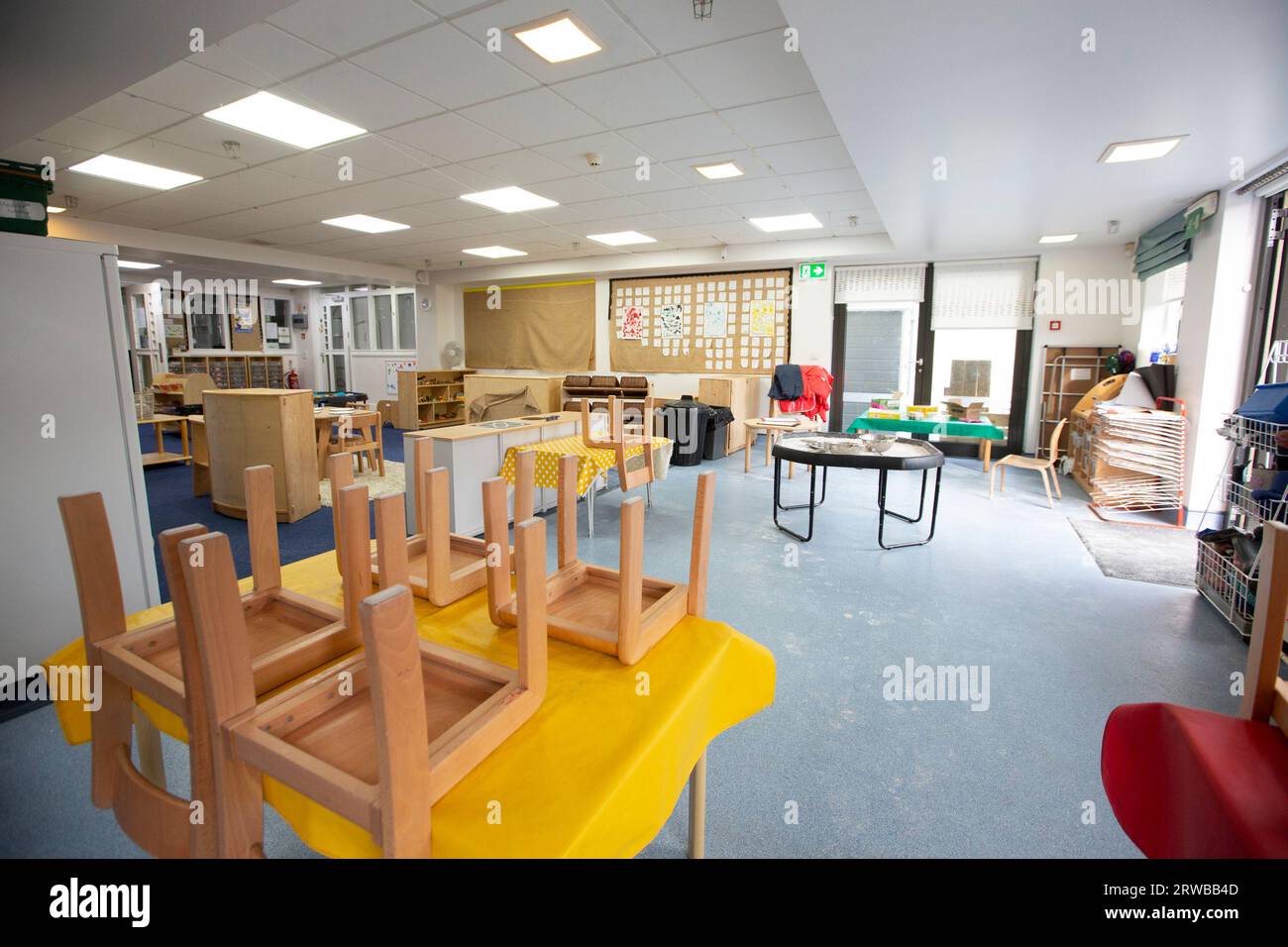 Nursery classroom scene for primary aged school children full of ...