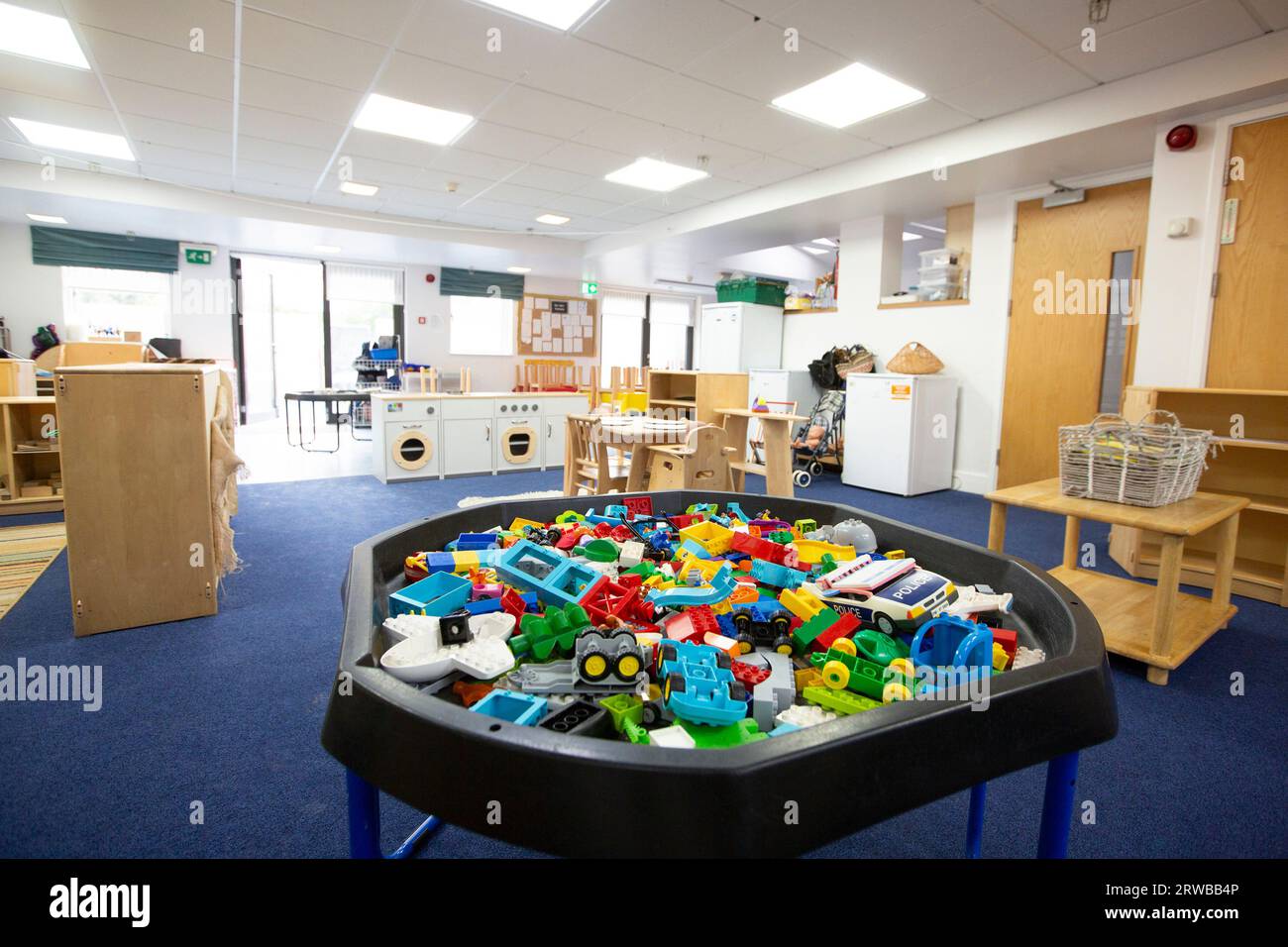 Nursery classroom scene for primary aged school children full of ...