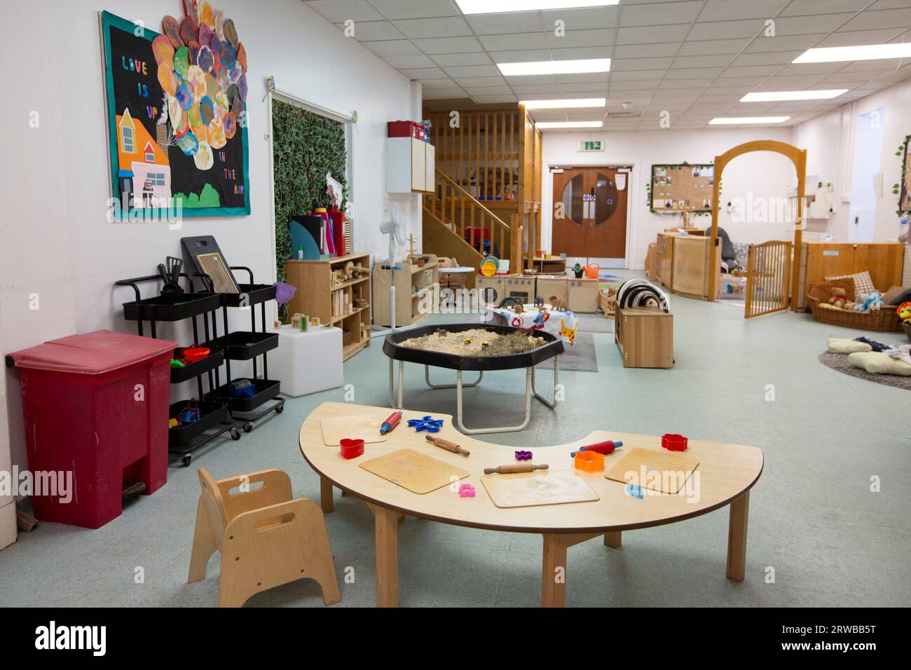 Nursery classroom scene for primary aged school children full of ...