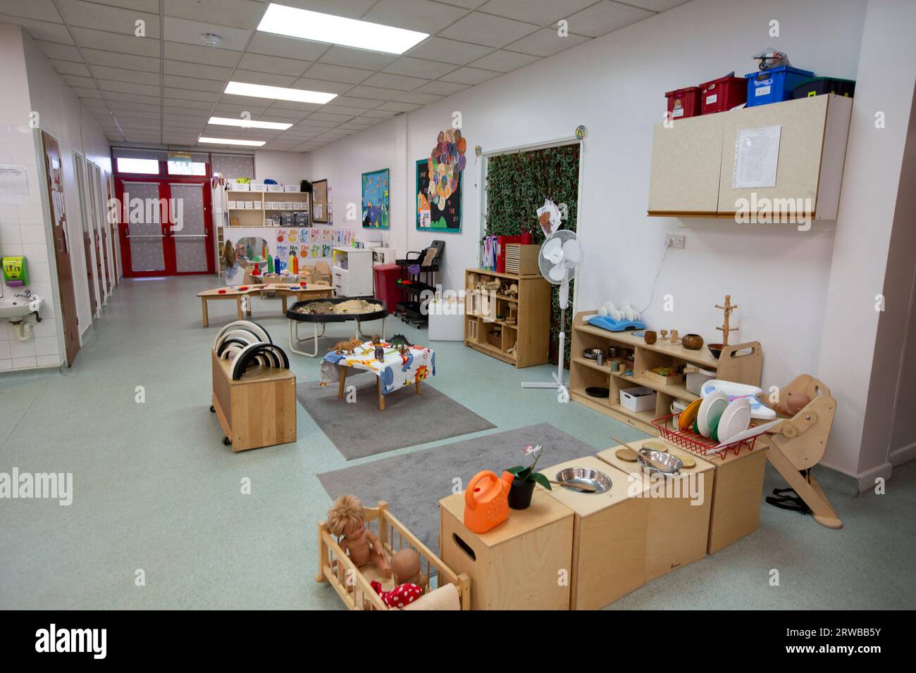 Nursery classroom scene for primary aged school children full of ...