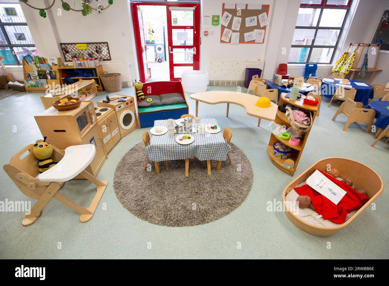Nursery classroom scene for primary aged school children full of ...