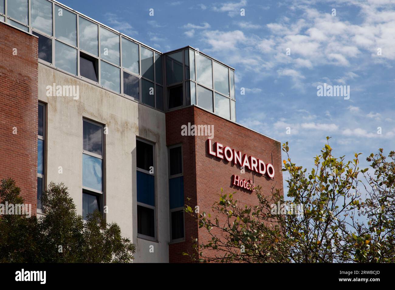 Leonardo hotels view of building with blue sky Stock Photo - Alamy