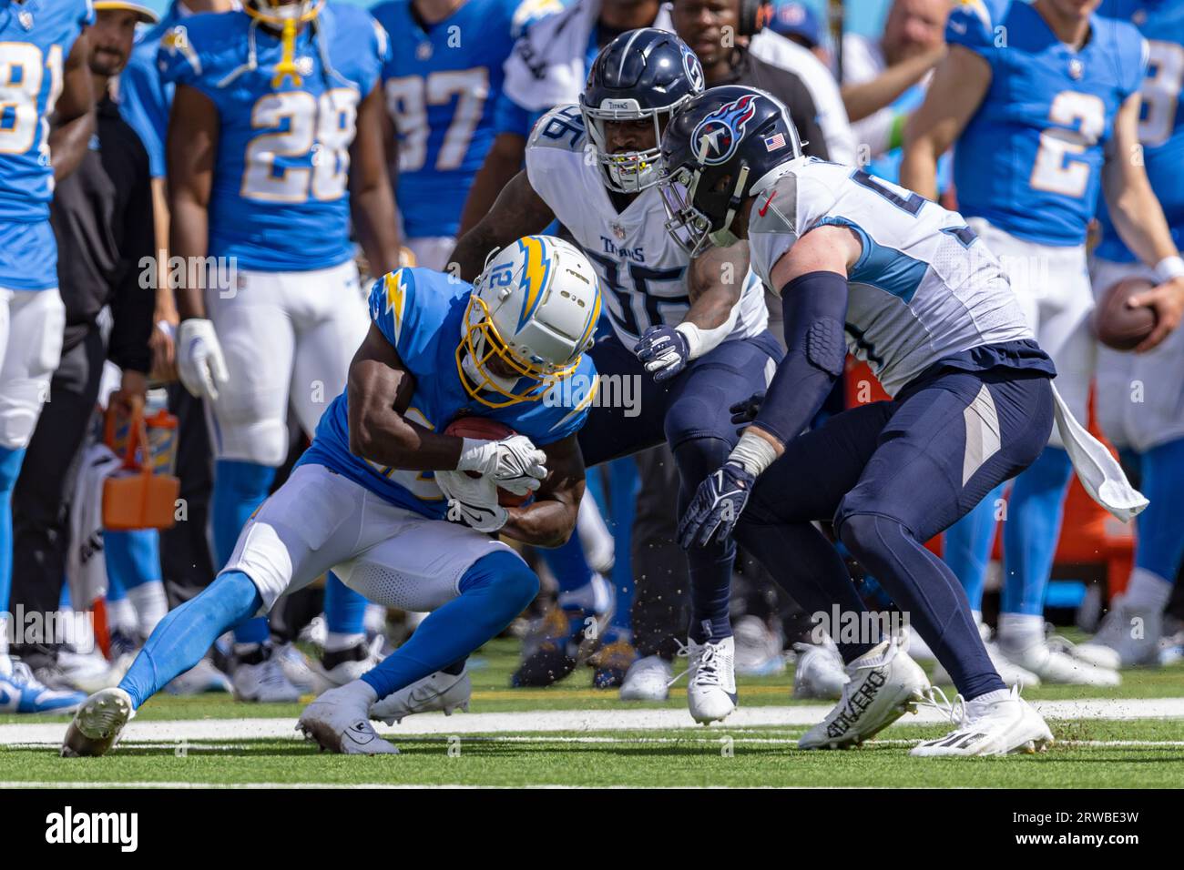 Los Angeles Chargers wide receiver Derius Davis (12) leans for yardage ...
