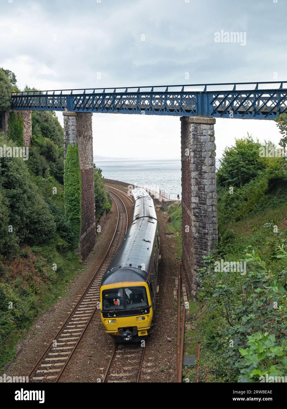 A local passenger train passing under the East Cliff bridge on the ...