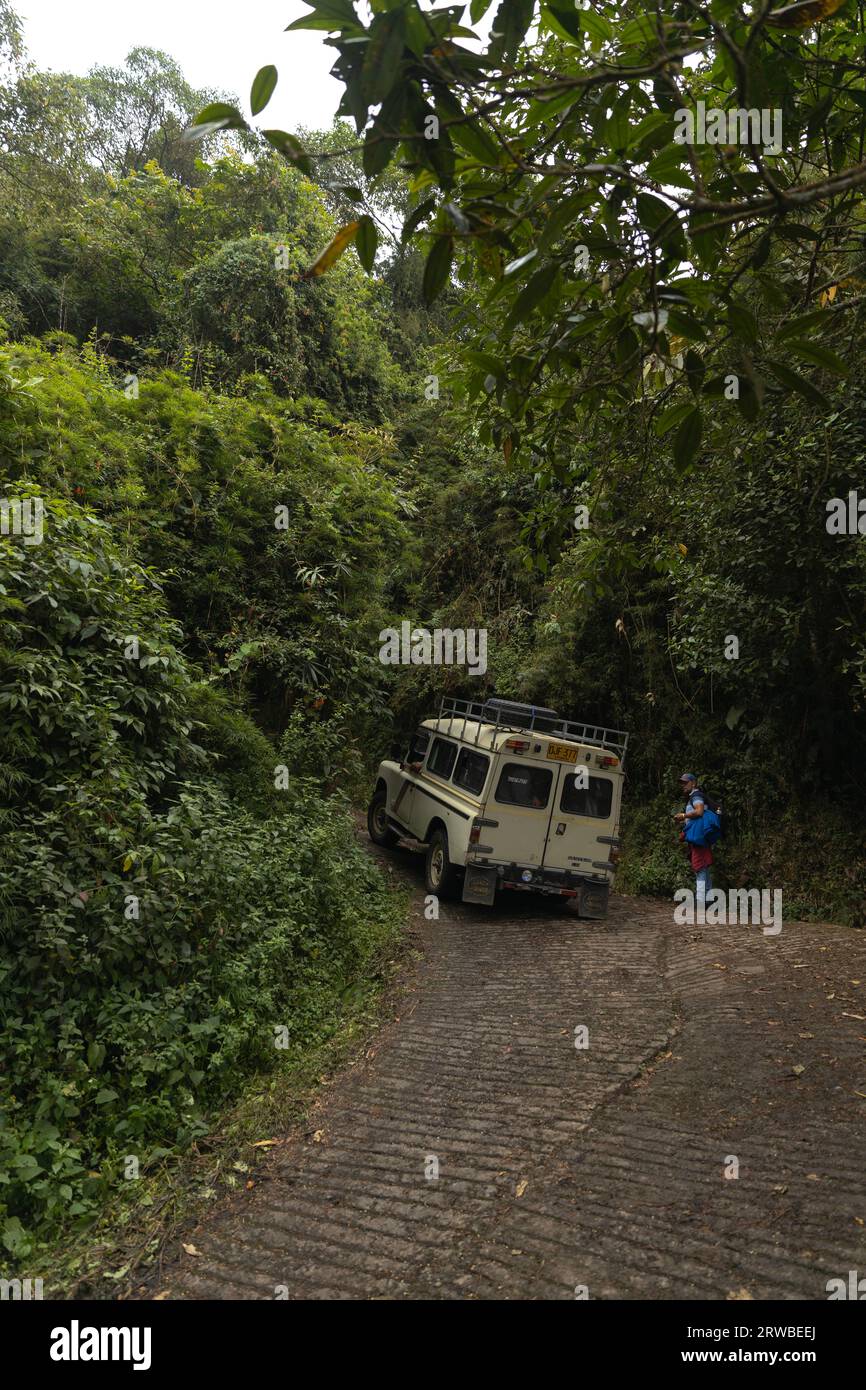 Car going up a mountain Stock Photo - Alamy