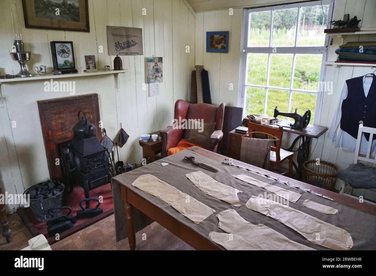 Inside a reconstructed vintage tailor's shop stocked with antiques and ...