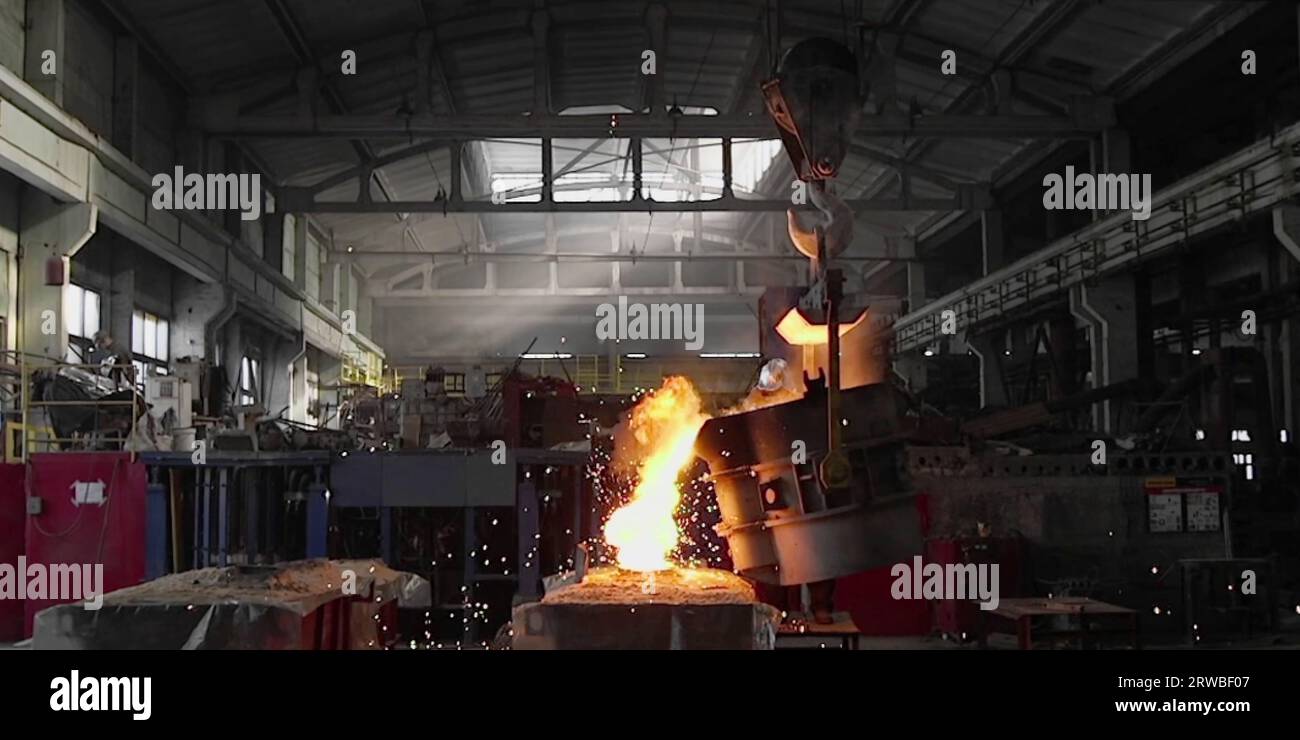Metal cast process in blast furnace in metallurgical plant or factory ...