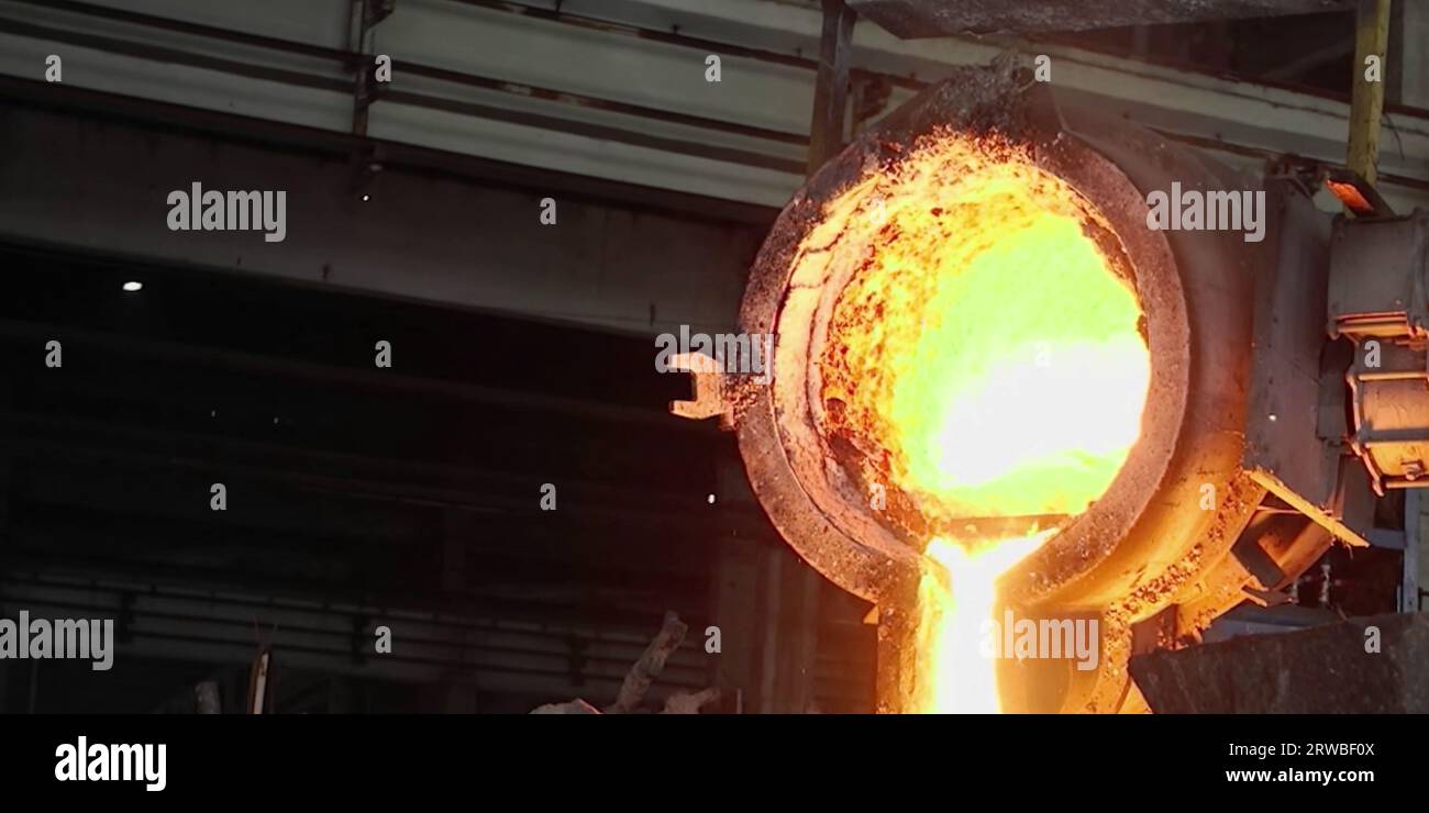 Metal cast process in blast furnace in metallurgical plant or factory ...