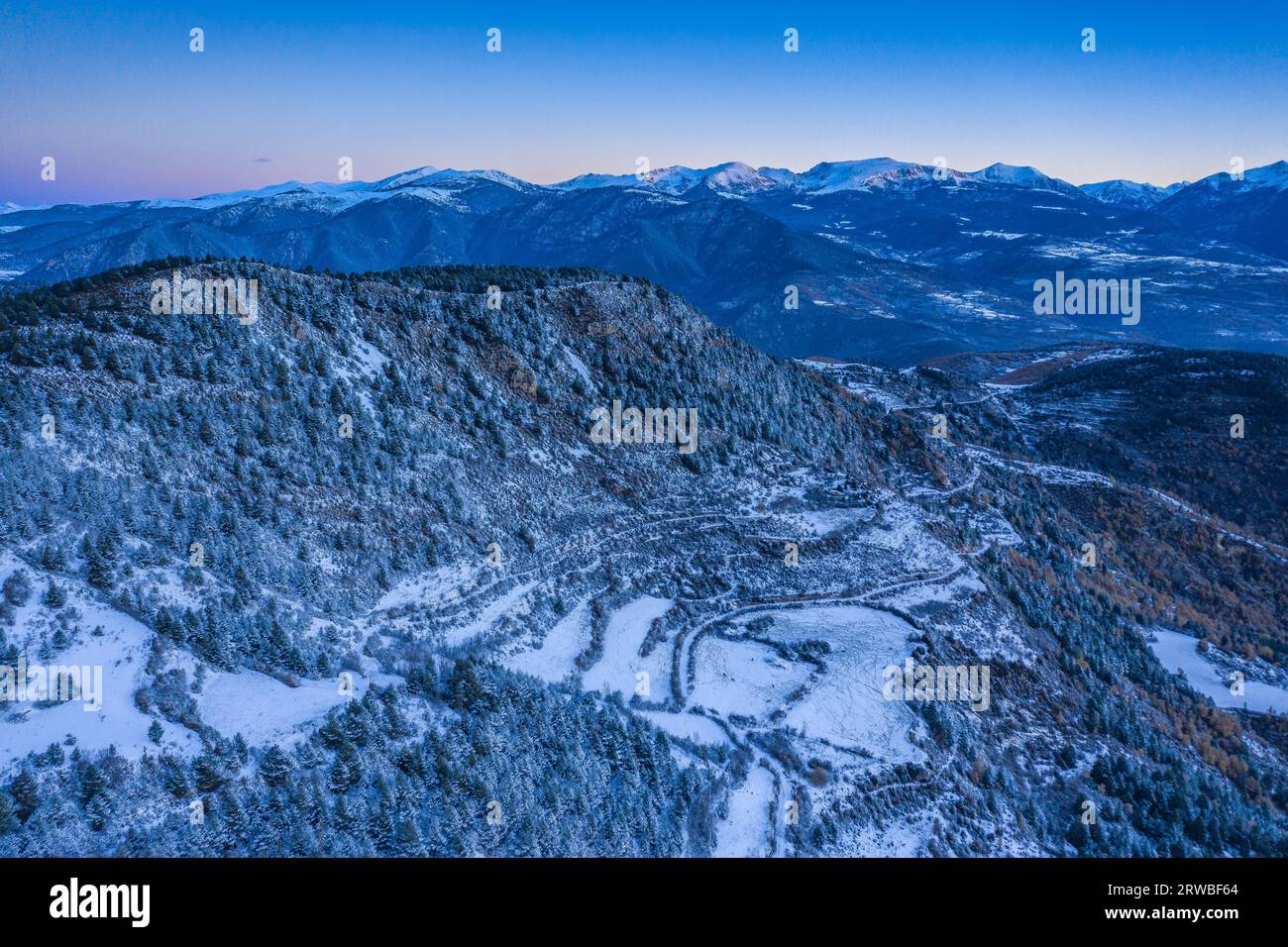 Aerial view of the snow-capped Cerdanya mountains, seen from near ...