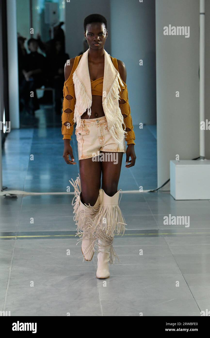 London, UK. 15th Sep, 2023. A model walks on the runway at the Mark ...