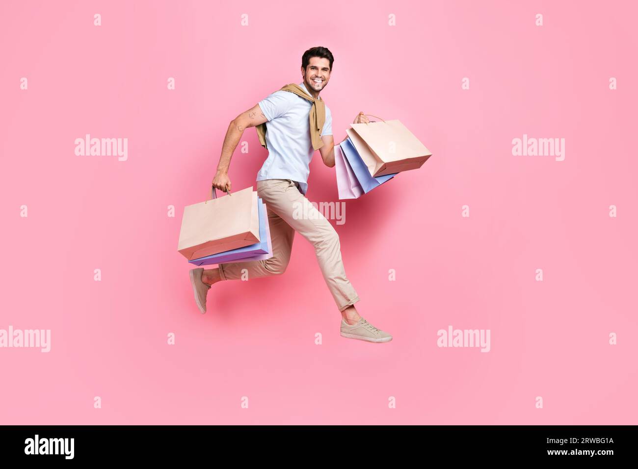 Full size profile photo of crazy excited person hold mall bags jump ...