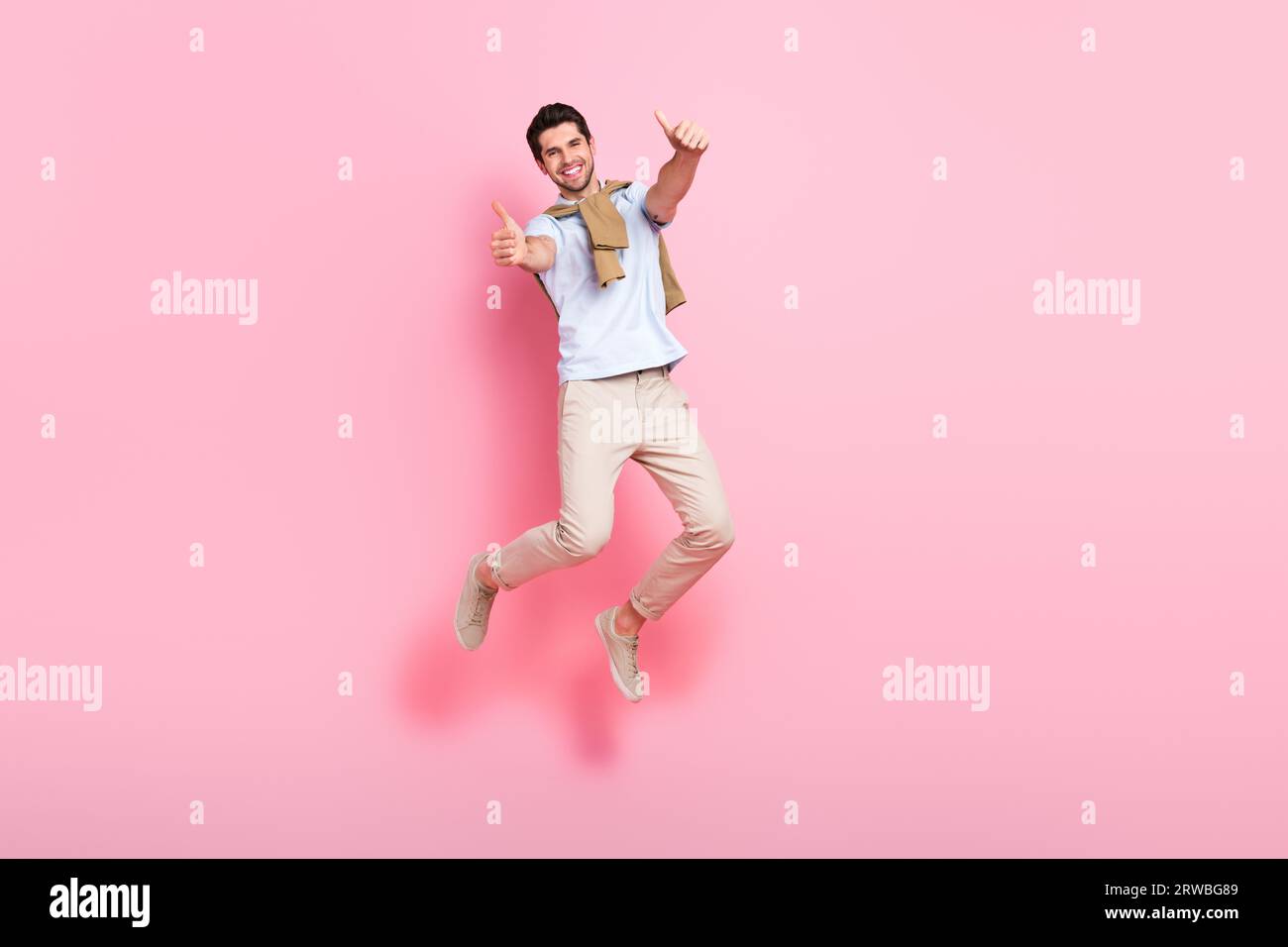 Full body photo of carefree cheerful person jumping hands fingers ...