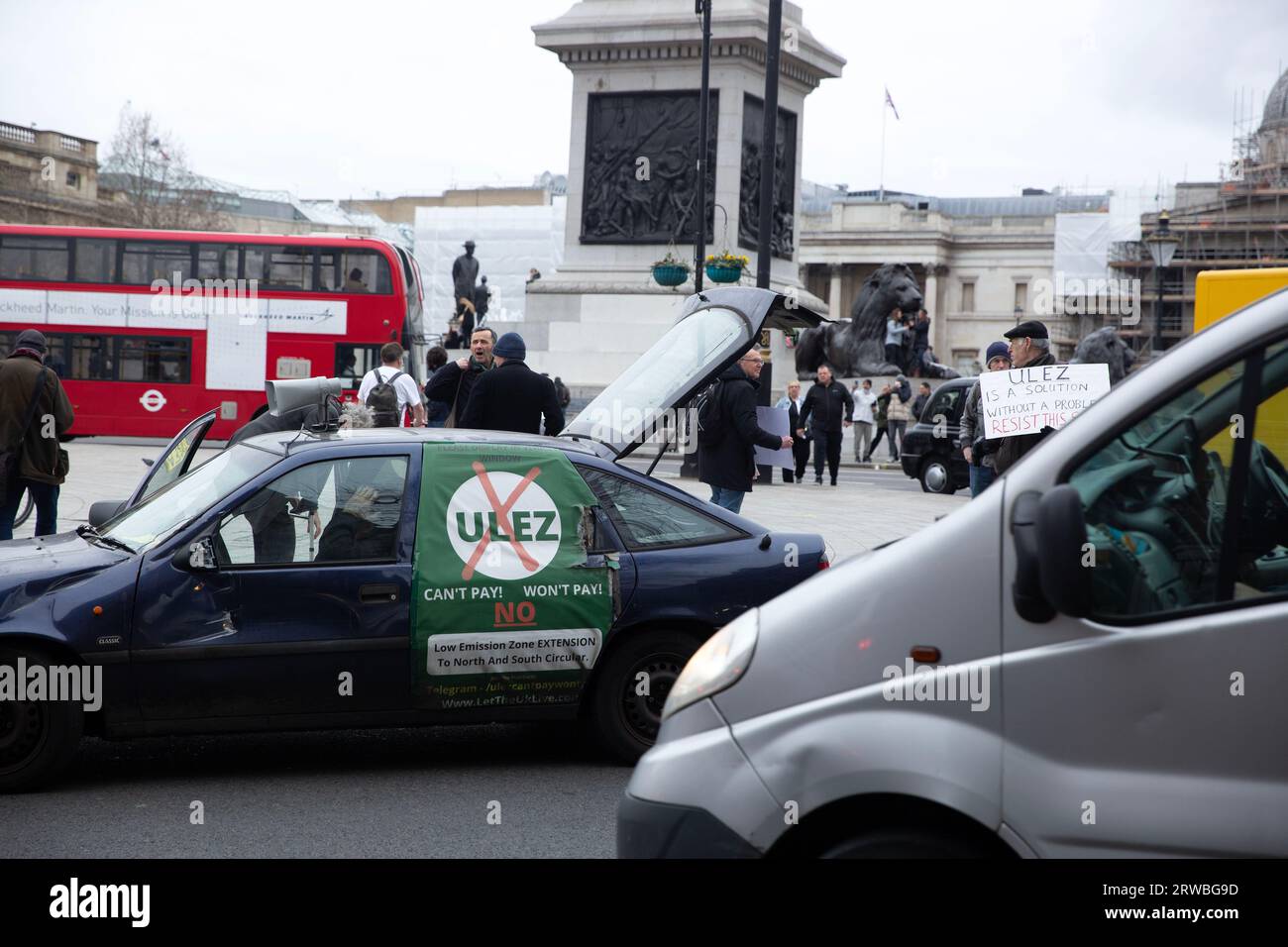 Participants gather with placards during a protest against the ...
