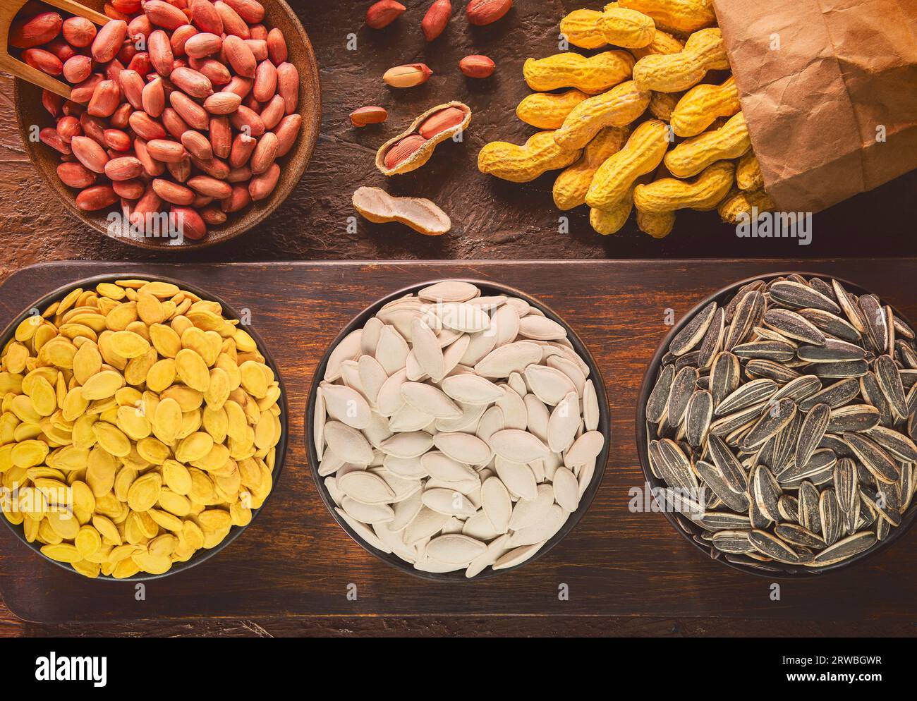 Assortment of Egyptian popular snacks sunflower seeds, watermelon seeds, pumpkin seeds and ...