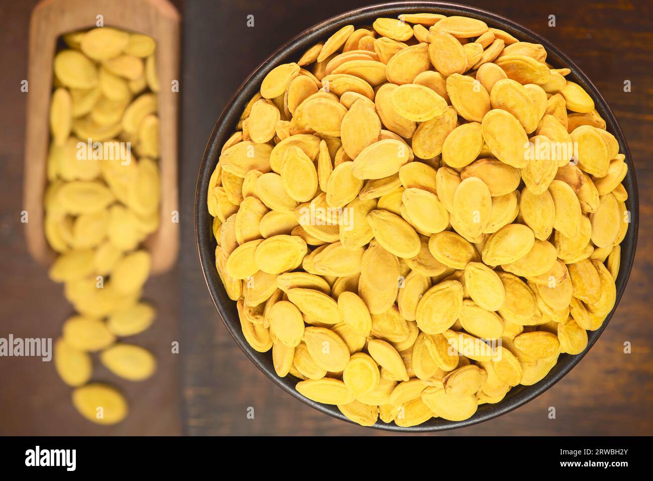 Salted organic watermelon seeds in bowl. top view with close up Stock ...