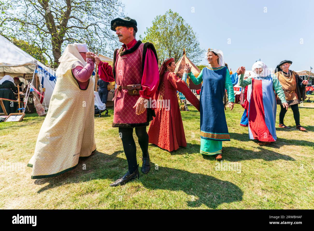 Medieval band of minstrels, Rough Musicke, in period costume dancing on ...