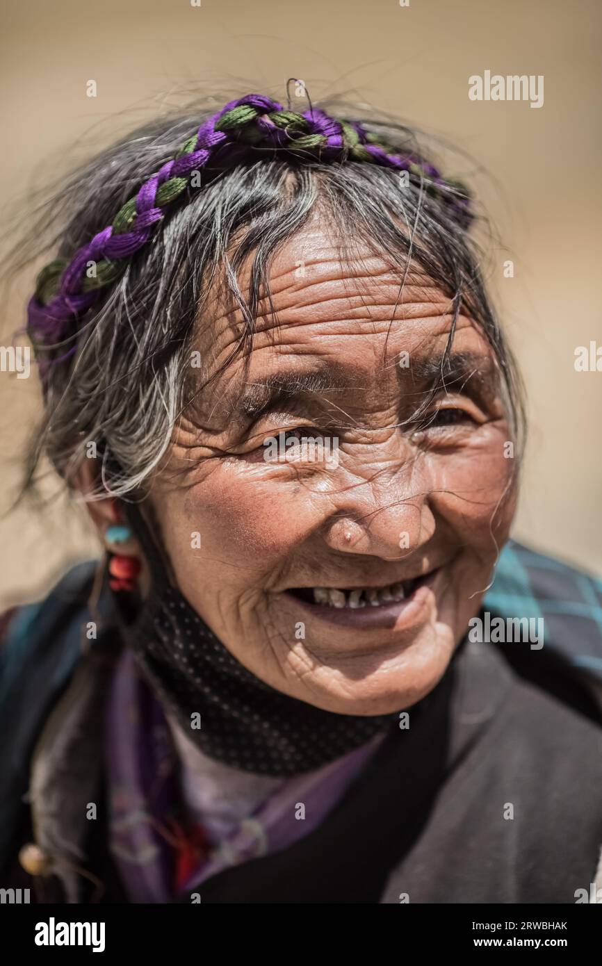 China, January 1st, 2019: Portrait of a resident of the Tibet ...
