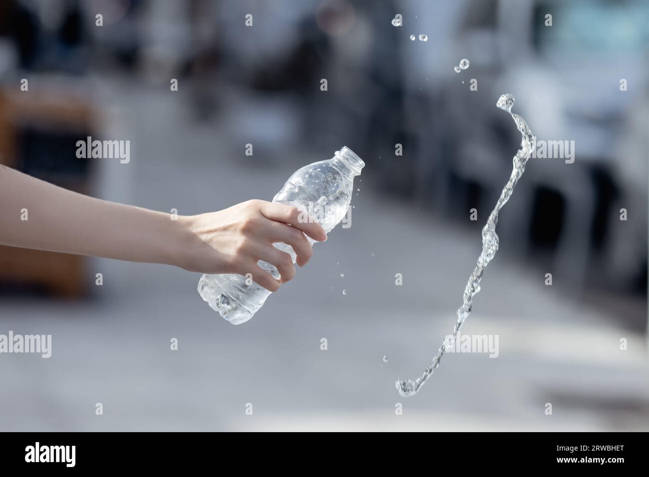 bottle of drinking water splashing out isolated on white Stock Photo ...