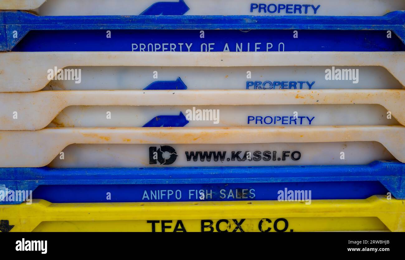Fish boxes in the harbour in Ullapool, Scotland Stock Photo - Alamy