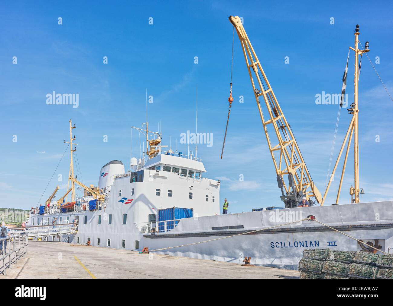 Crane on the Scillonian III ferry, docked at the quay in the harbour of ...