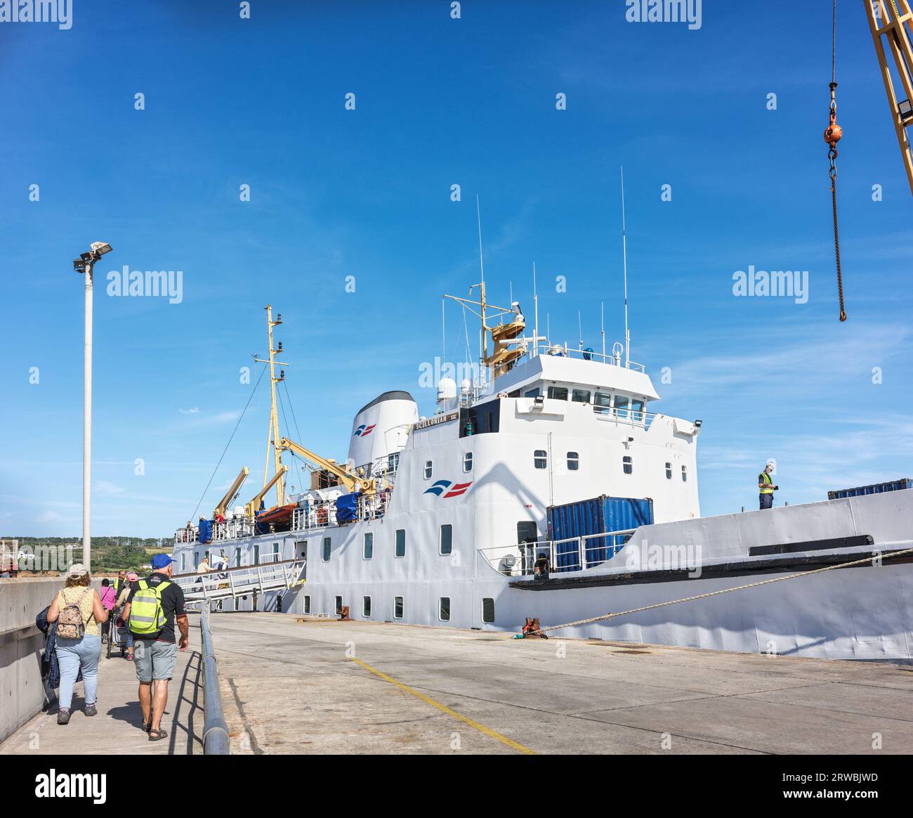 Passengers on their way to board the Scillonian III ferry docked at the ...