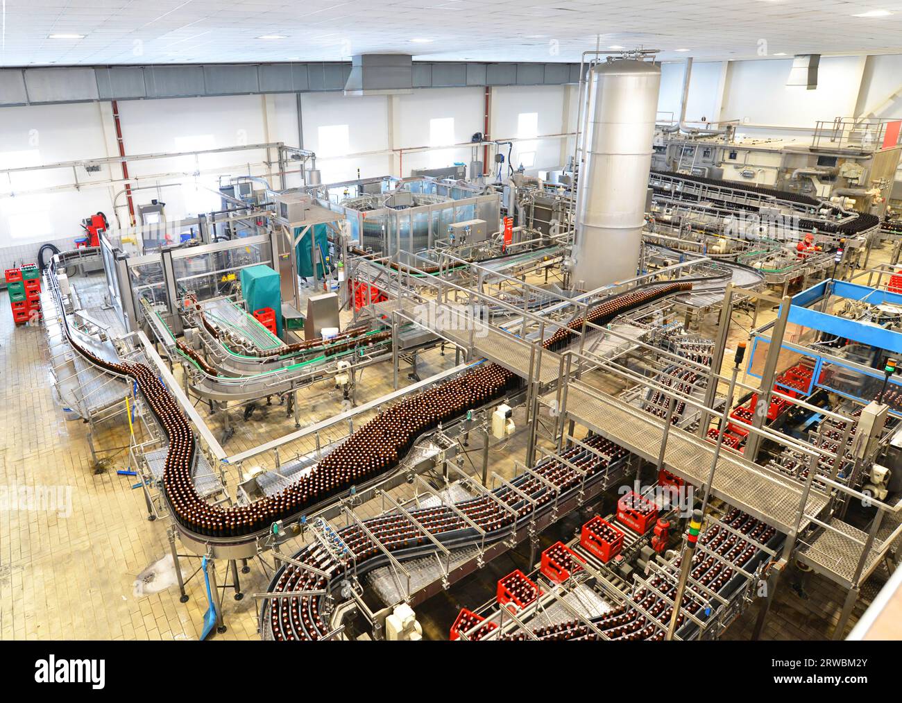 modern factory in the food industry - beer brewery - conveyor belt with ...