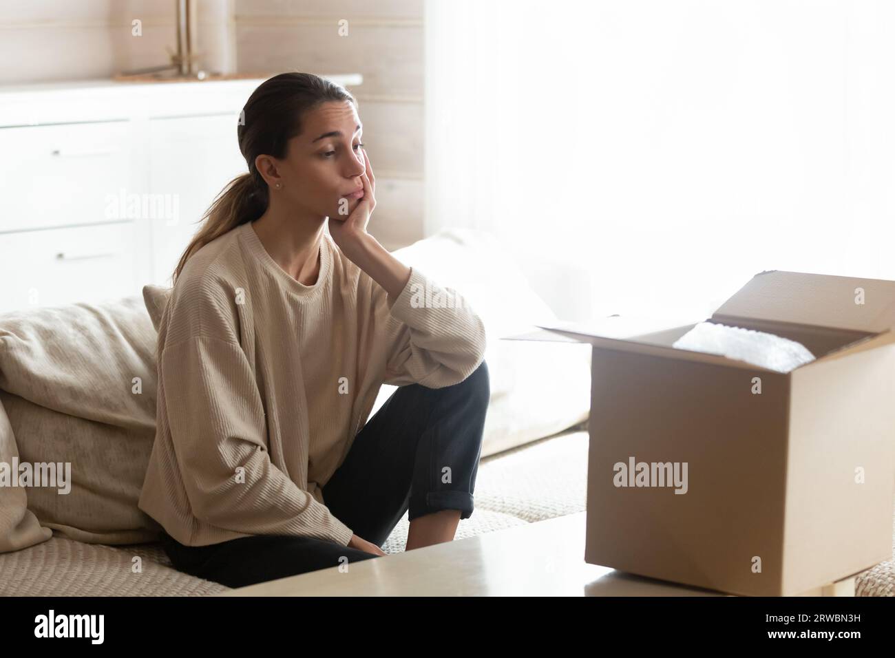Upset annoyed young woman irritated by bad delivery service Stock Photo ...