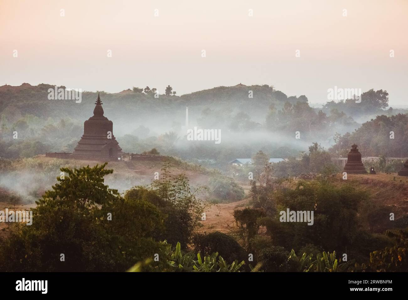 Amazing watercolor view of foggy morning landscape with farm fields at ...