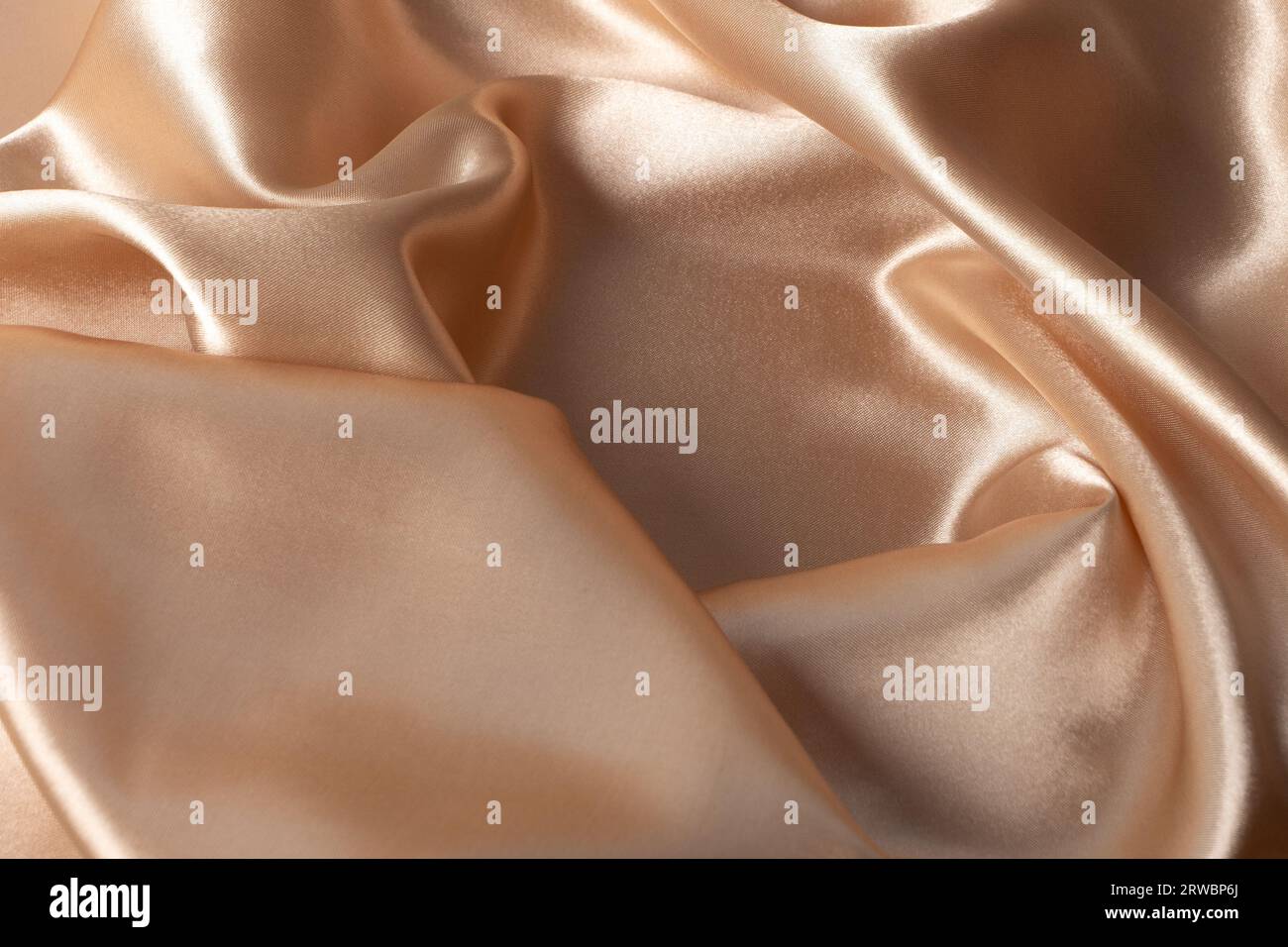 Beautiful background luxury cloth with drapery and wavy folds of brown ...