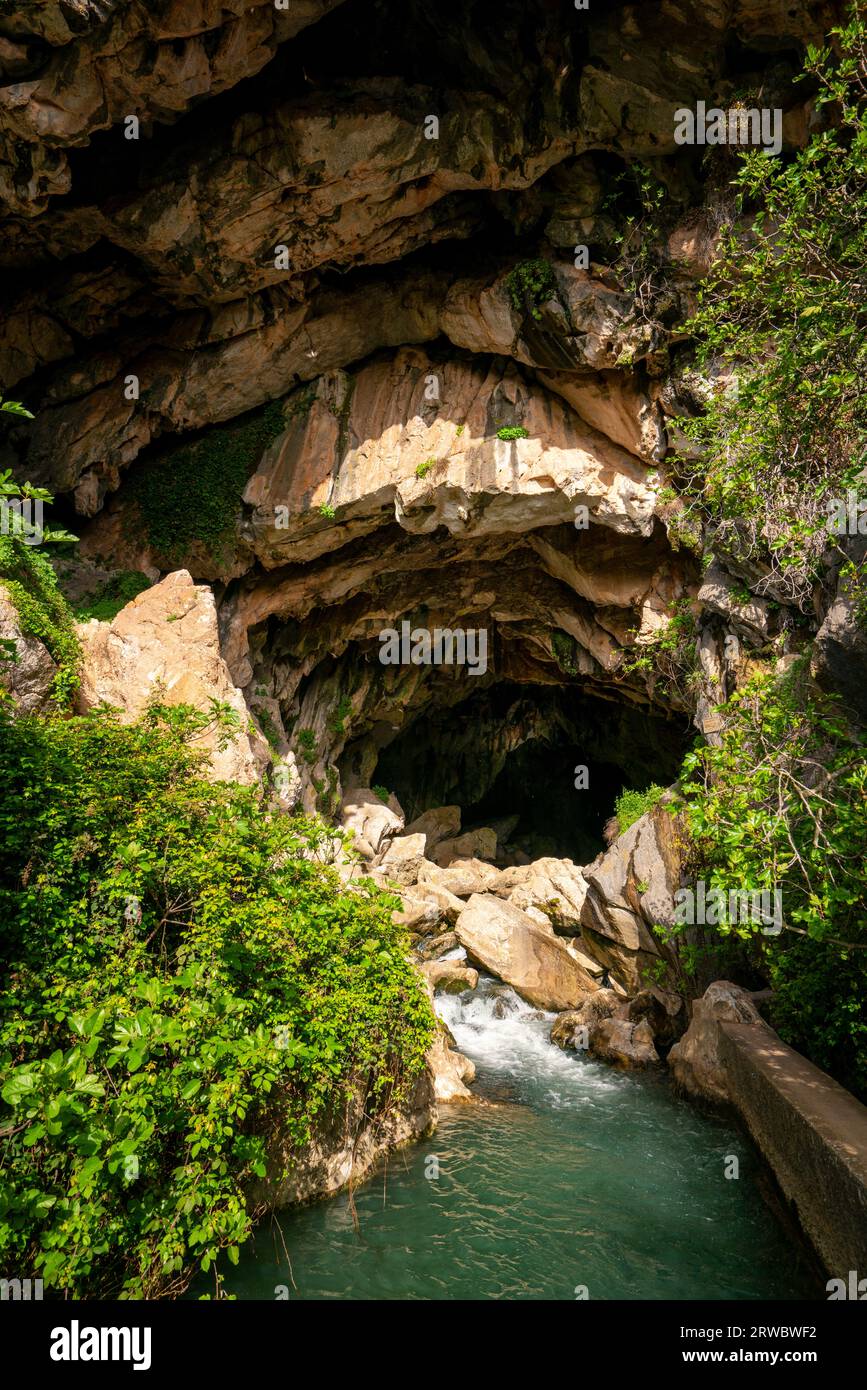 From above transparent clear rippling river water flowing through rocky ...