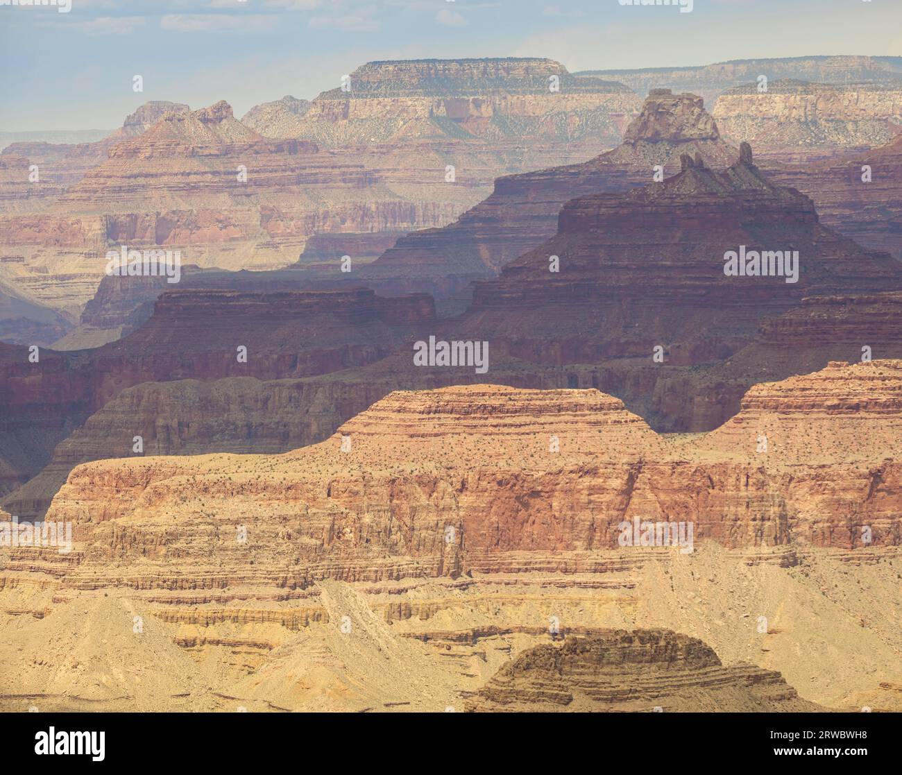 Spectacular scenery of yellow colored rocky Grand Canyon with rough ...