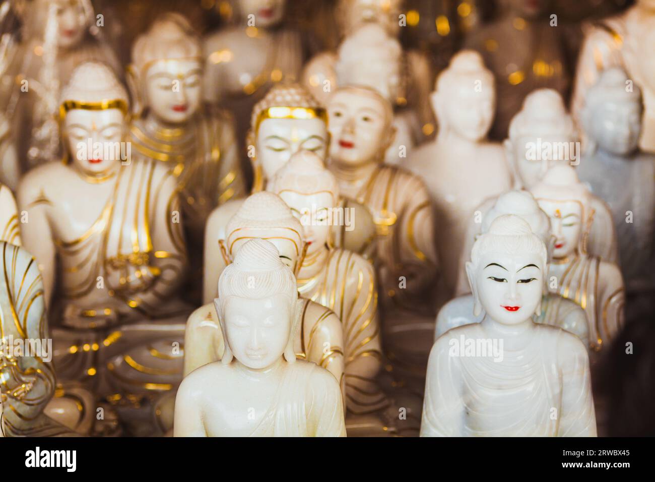 White marble buddha statue carved hi-res stock photography and images ...