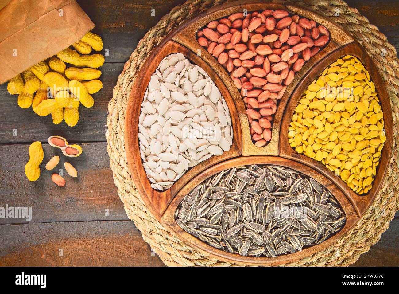 Assortment of Egyptian popular snacks sunflower seeds, watermelon seeds, pumpkin seeds and ...