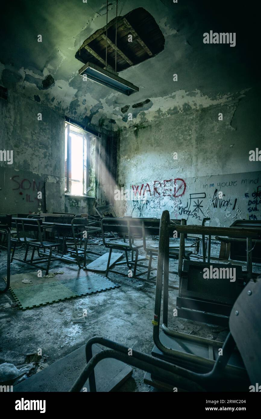 decaying and vandalised interior of a school classroom Stock Photo - Alamy