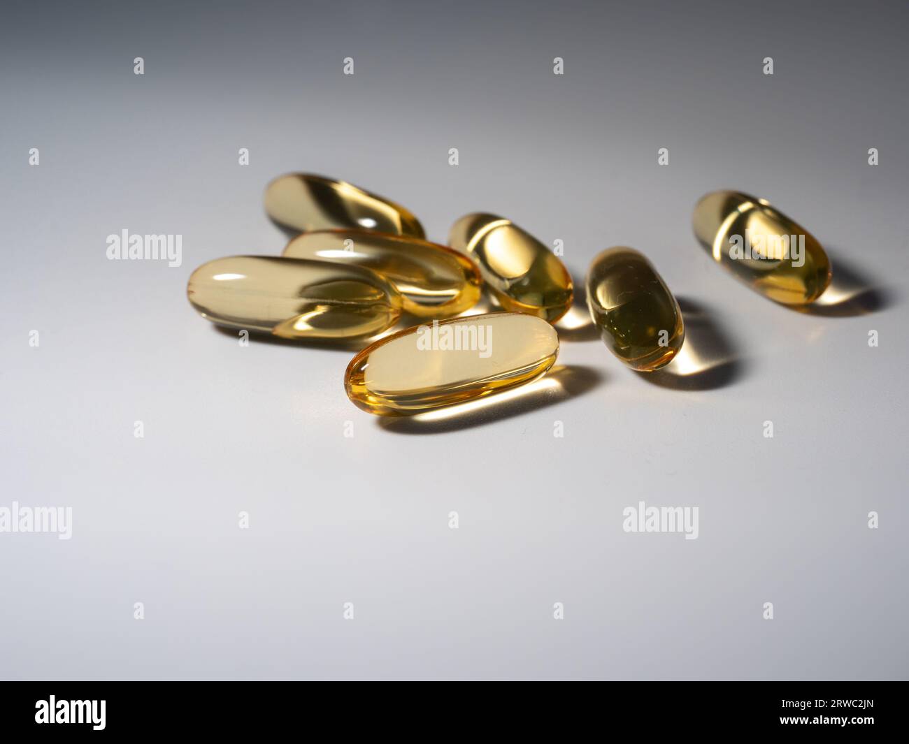 Cod liver oil pills dietary supplements on a White background Stock ...