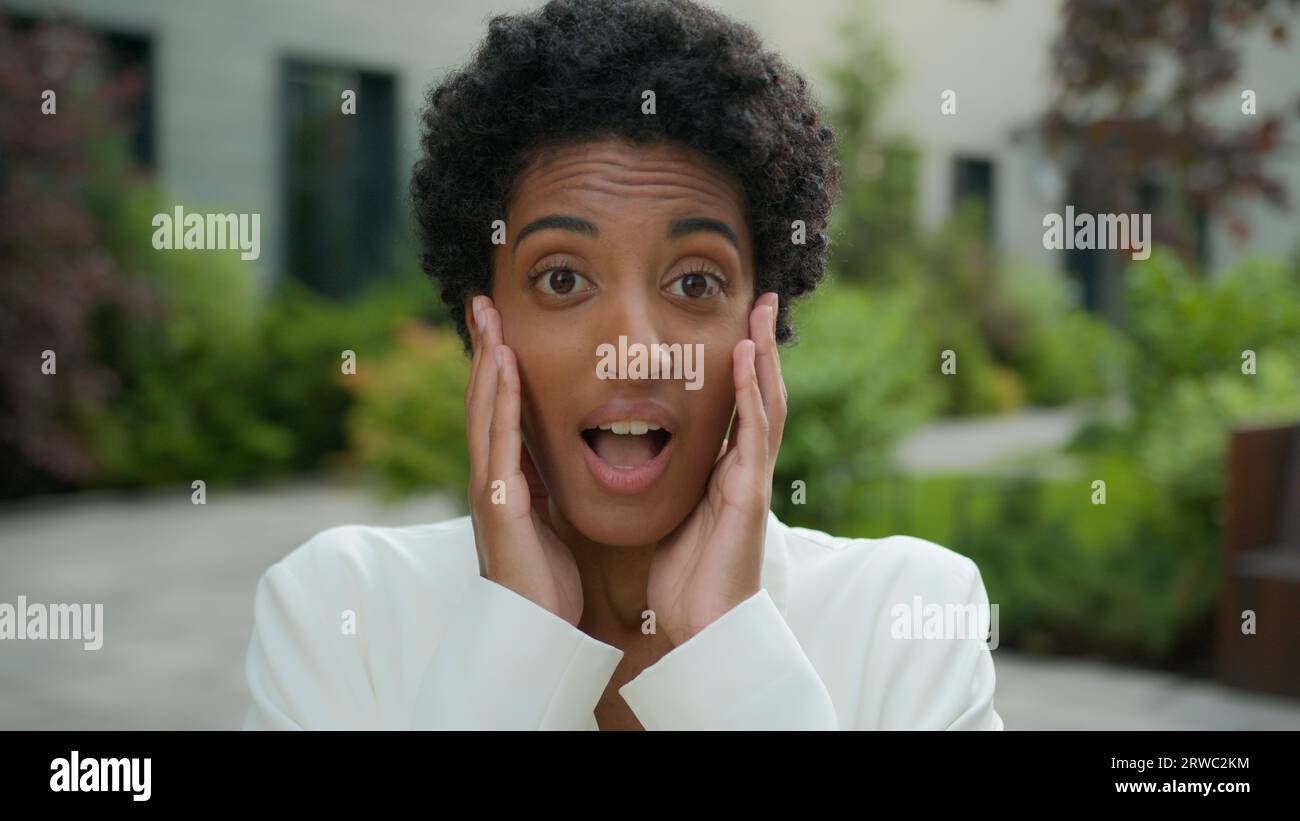 Business city portrait outdoors shocked amazed wonder African American ...