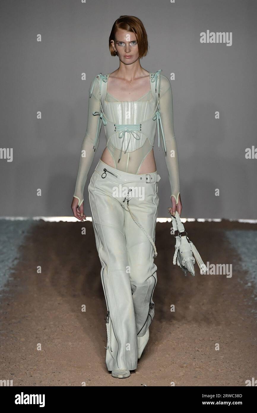 London, UK. 17th Sep, 2023. A model walks on the runway at the Knwls ...