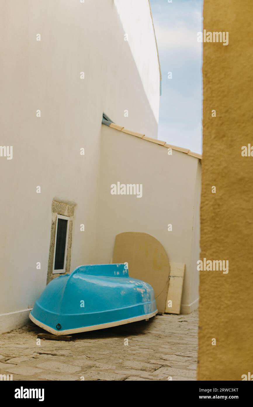 Beautiful blue boat on the street of old Dubrovnik town. Minimal ...
