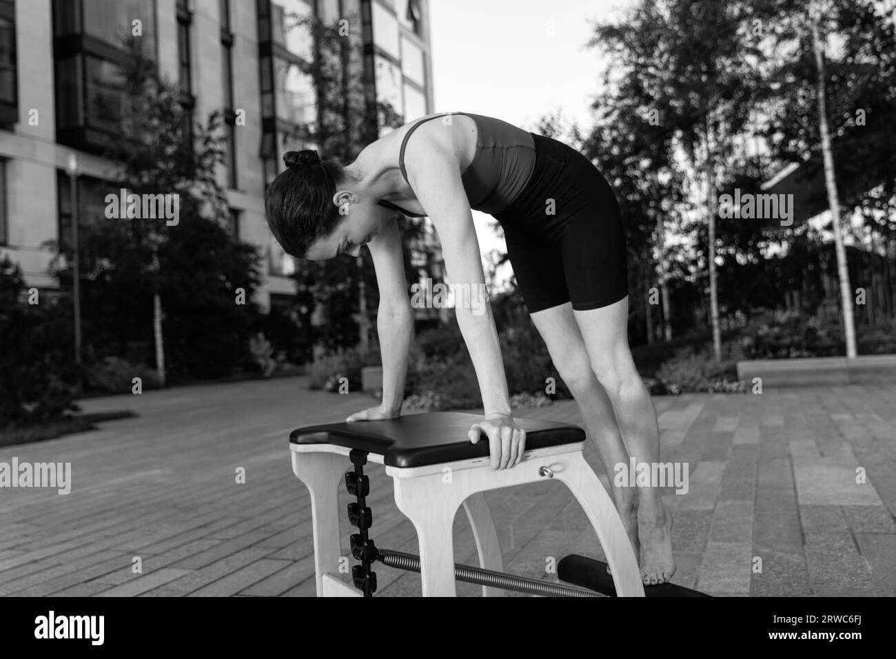 Pilates reformer chair woman fitness yoga gym exercise. Correction of ...