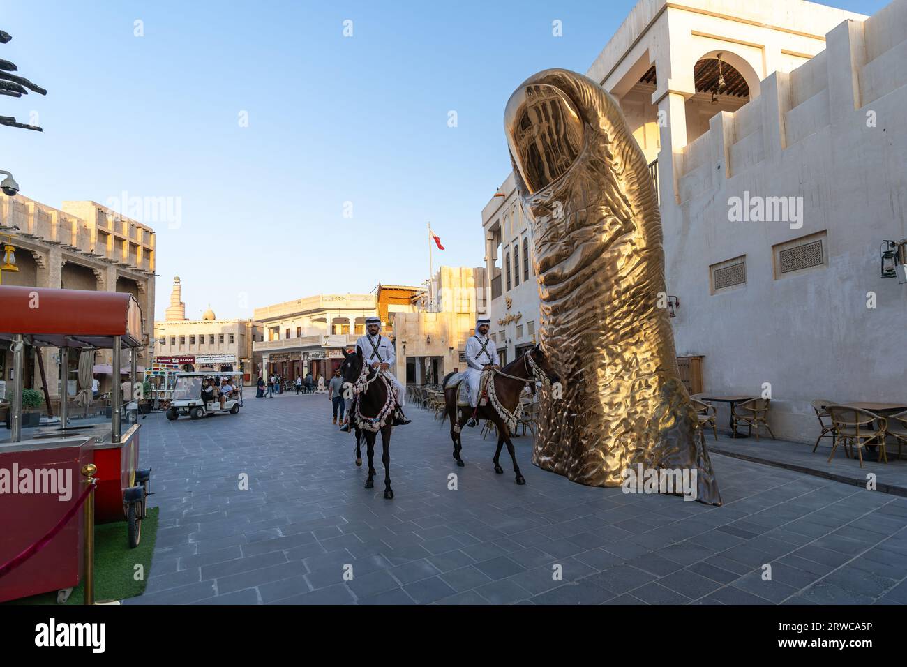 Doha, Qatar - Oct 17, 2022: Tourist police in traditional Qatari dress ...