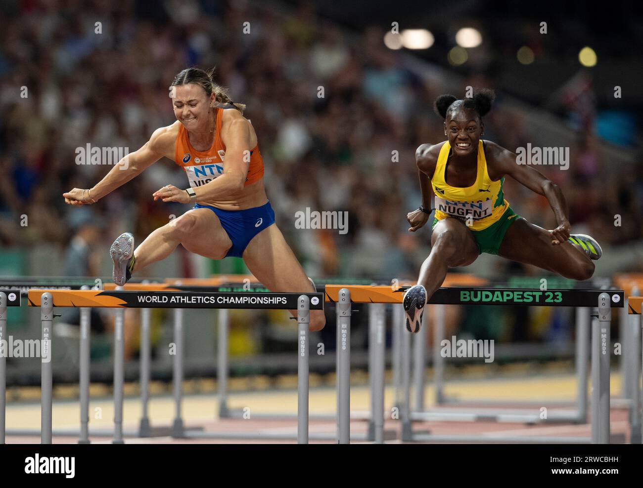 Nadine Visser of the Netherlands and Ackera Nugent of Jamaica competing ...