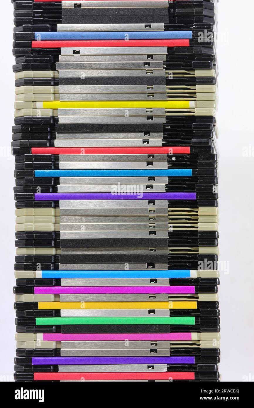 colorful old floppy disks used to save data and computer programs in ...