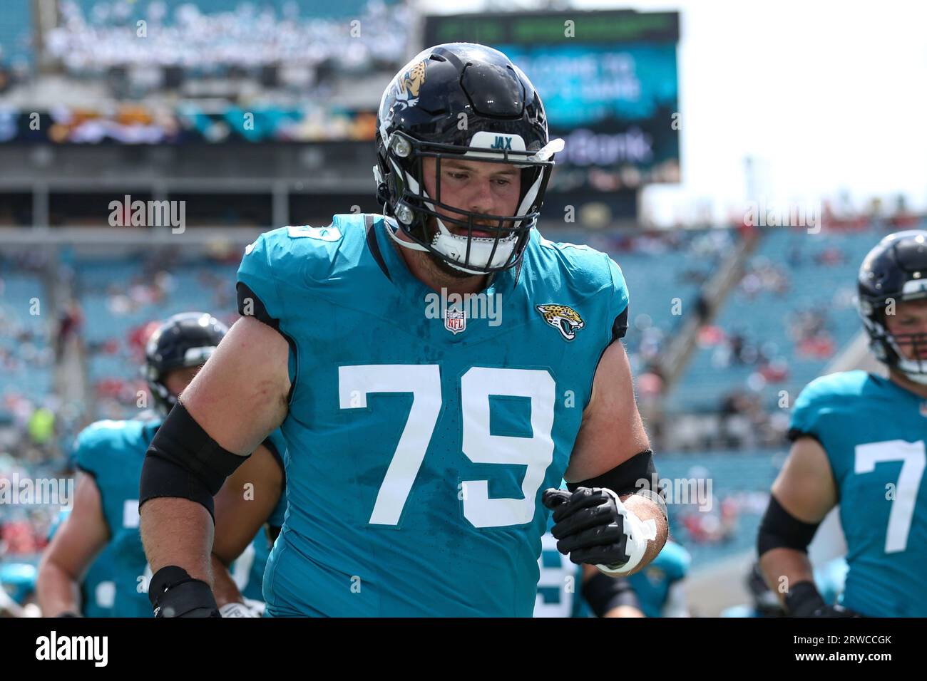 Jacksonville Jaguars center Luke Fortner (79) heads to the locker room ...