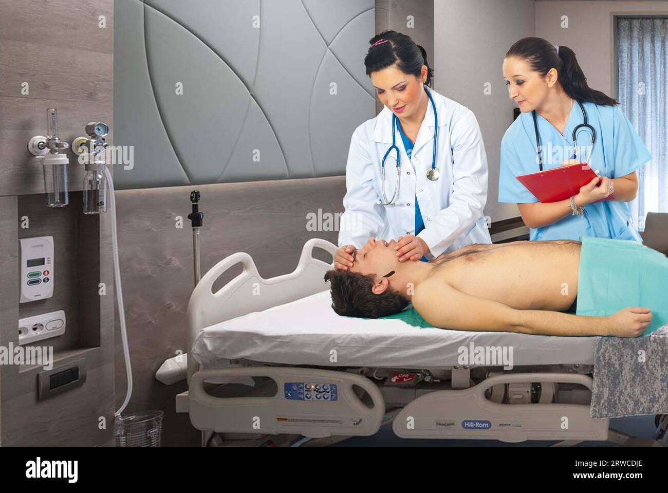 Doctor woman teaching a student female to make resuscitation on patient ...