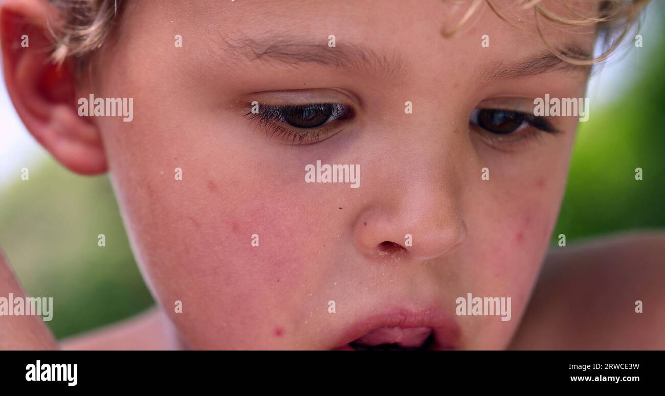 Pensive child boy toddler thinking. Thoughtful kid staring blankly ...